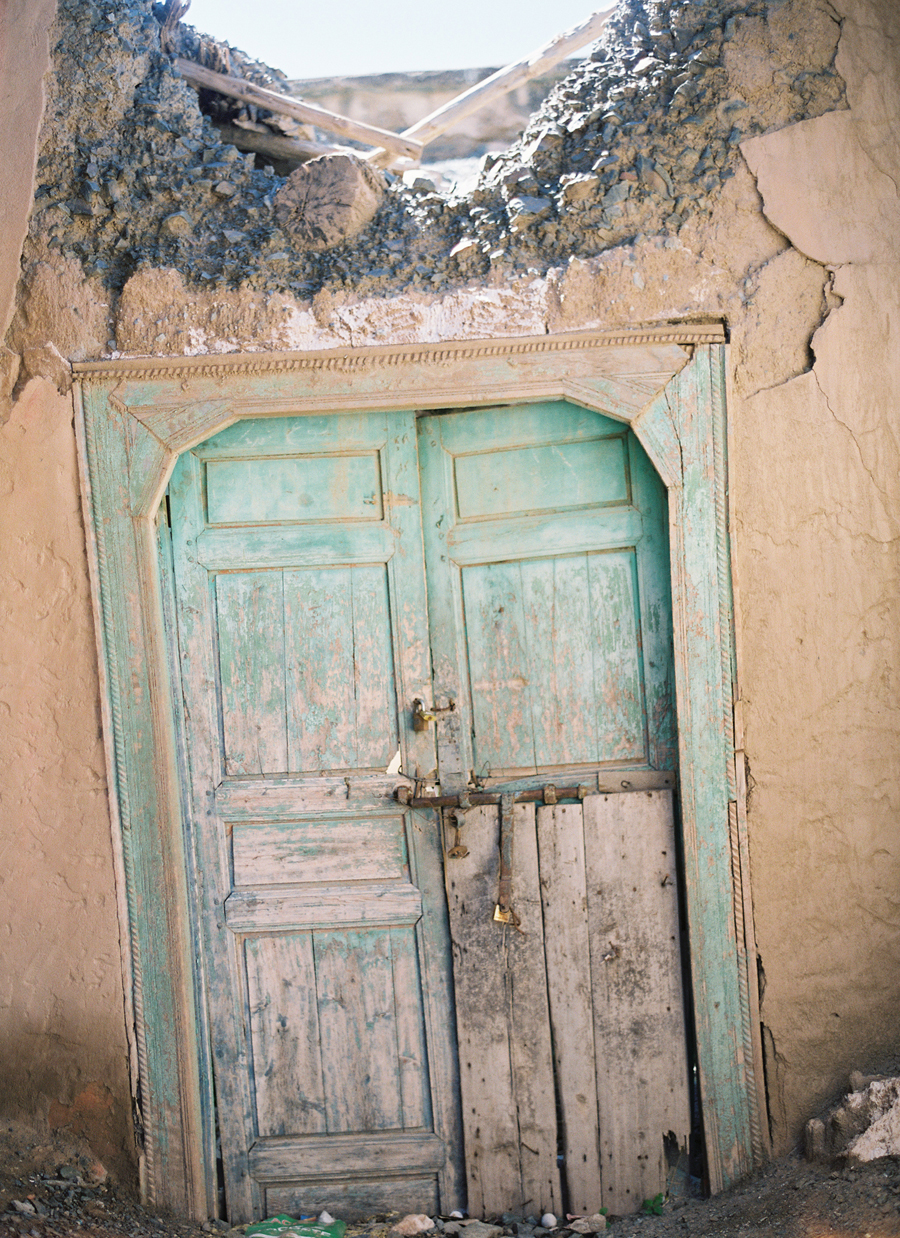 Crumbling Walls and Teal Door in Morocco - Entouriste