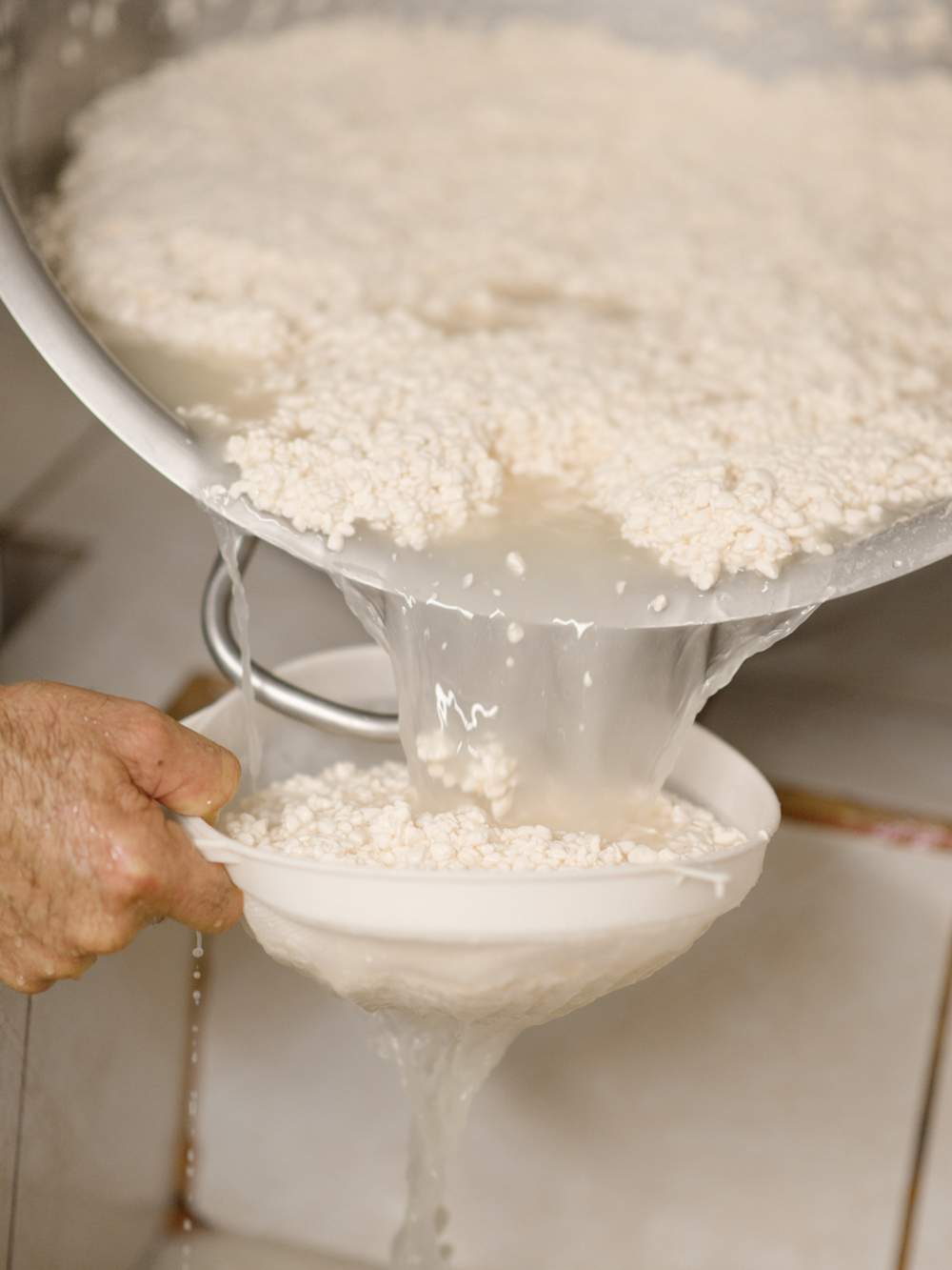 Straining the Cheese at a Costa Rica Cheese Workshop - Entouriste